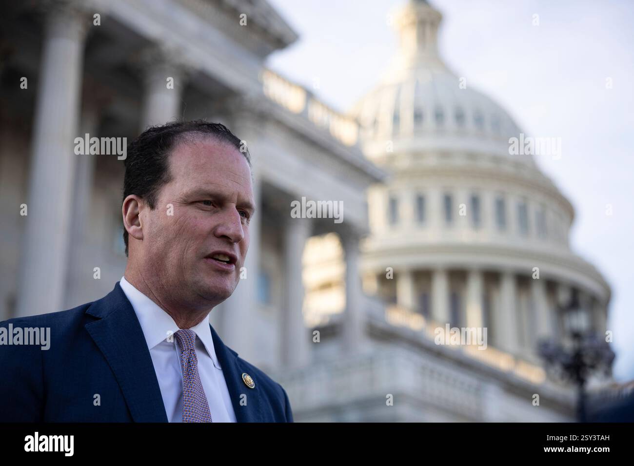 Rep. August Pfluger (R-Texas) speaks with reporters as he departs a ...