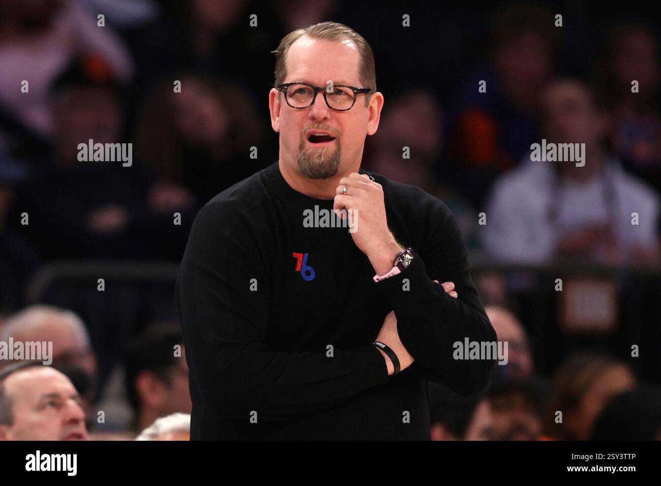 Philadelphia 76ers head coach Nick Nurse stands on the court during the ...