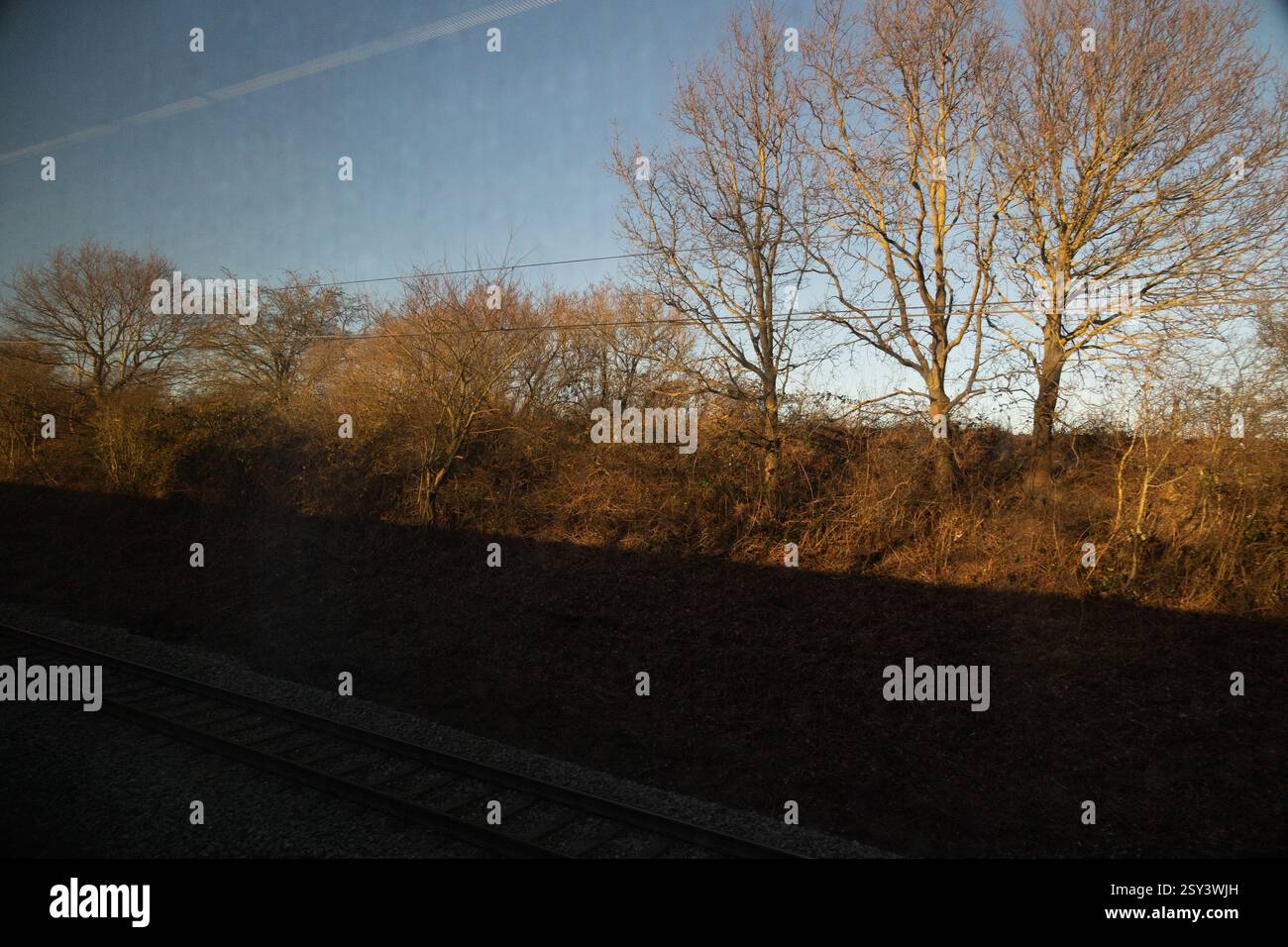The landscape seen through a window of the InterCity DSB IC 846 train ...