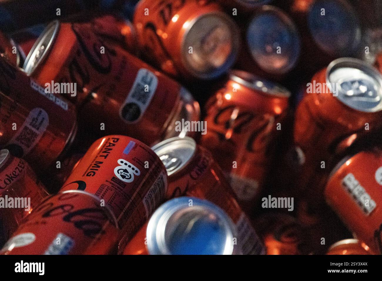Denmark. 09th Feb, 2025. In this photo illustration, a pile of Coca ...