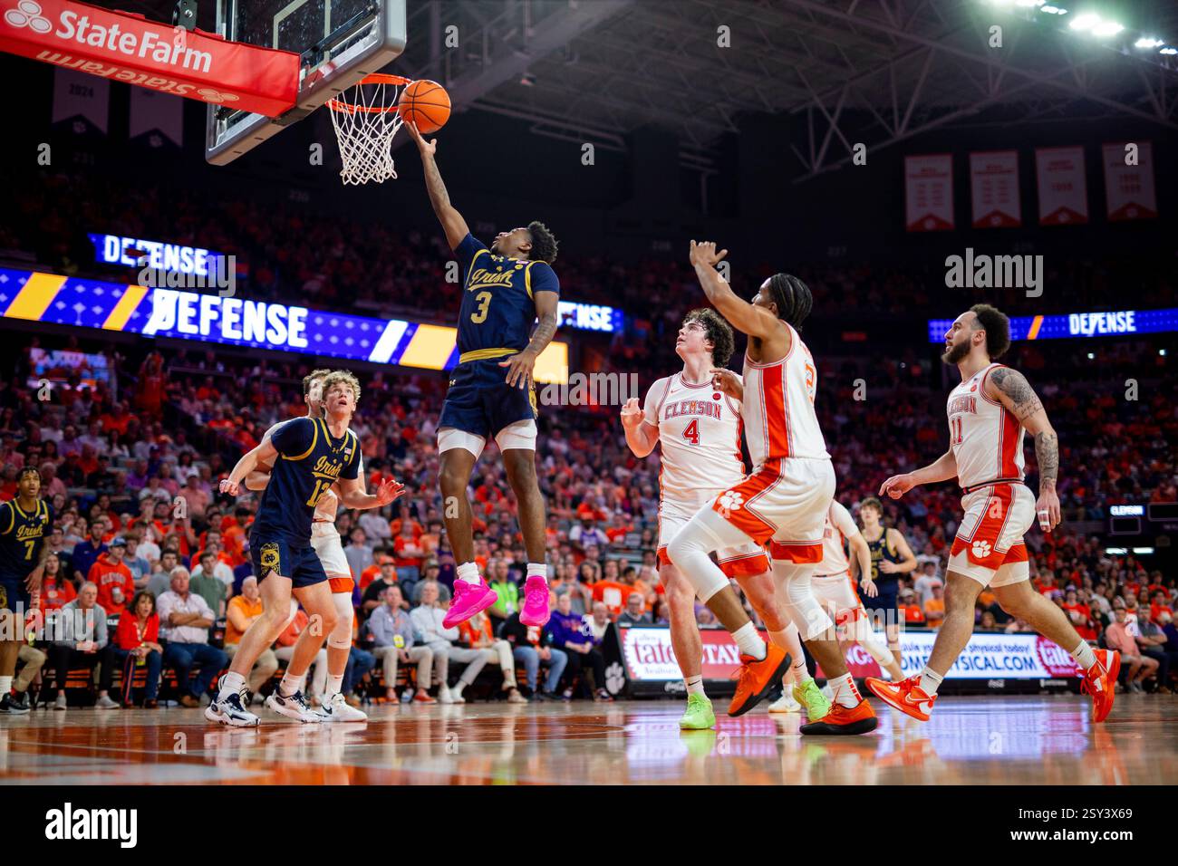 Notre Dame guard Markus Burton (3) lays up against Clemson during the ...