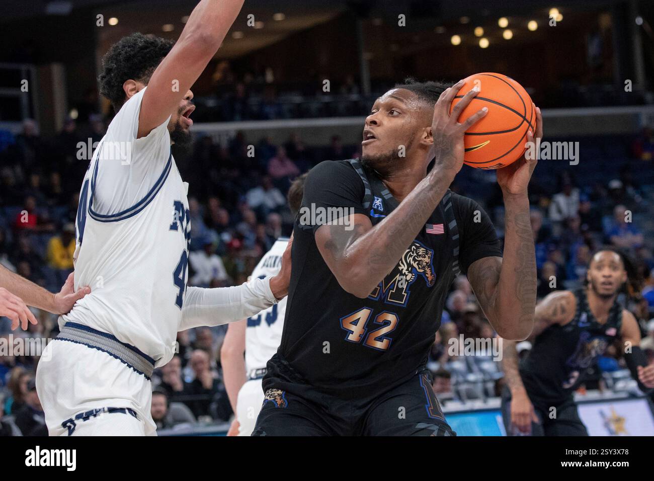 Rice forward Caden Powell defends Memphis forward Dain Dainja (42 ...