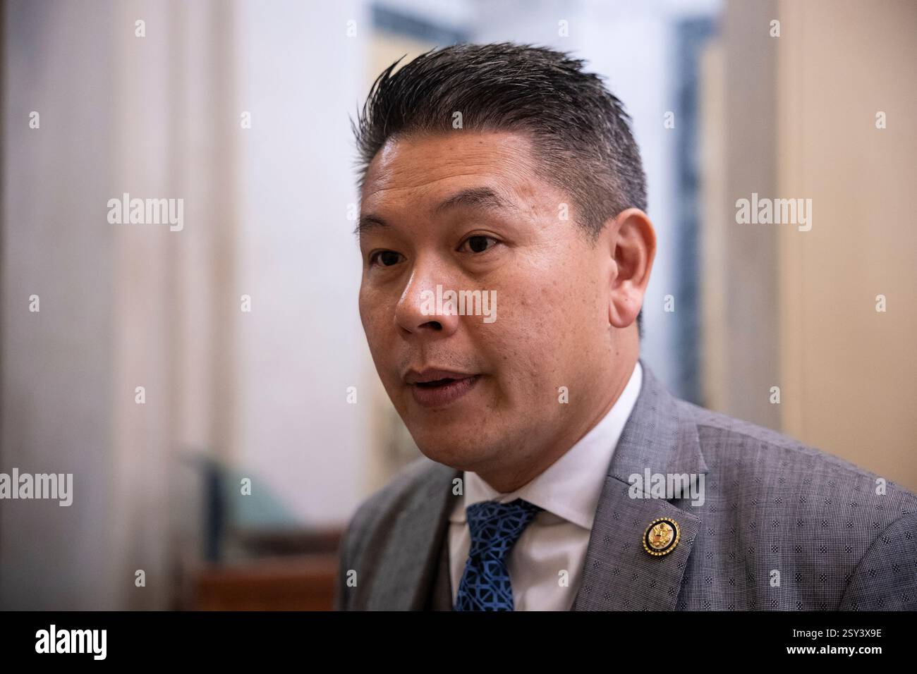 Rep. Derek Tran (D-Calif.) speaks with a reporter as he arrives for a ...