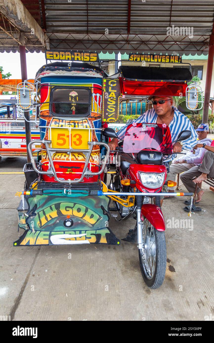 Colorful tricycles lined up in hi-res stock photography and images - Alamy