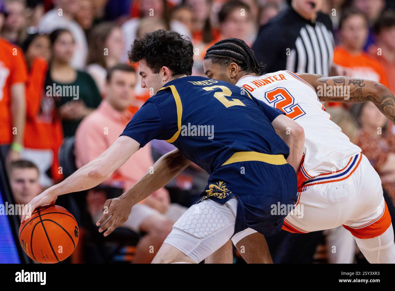 Clemson guard Dillon Hunter (2) goes for a steal on Notre Dame guard ...