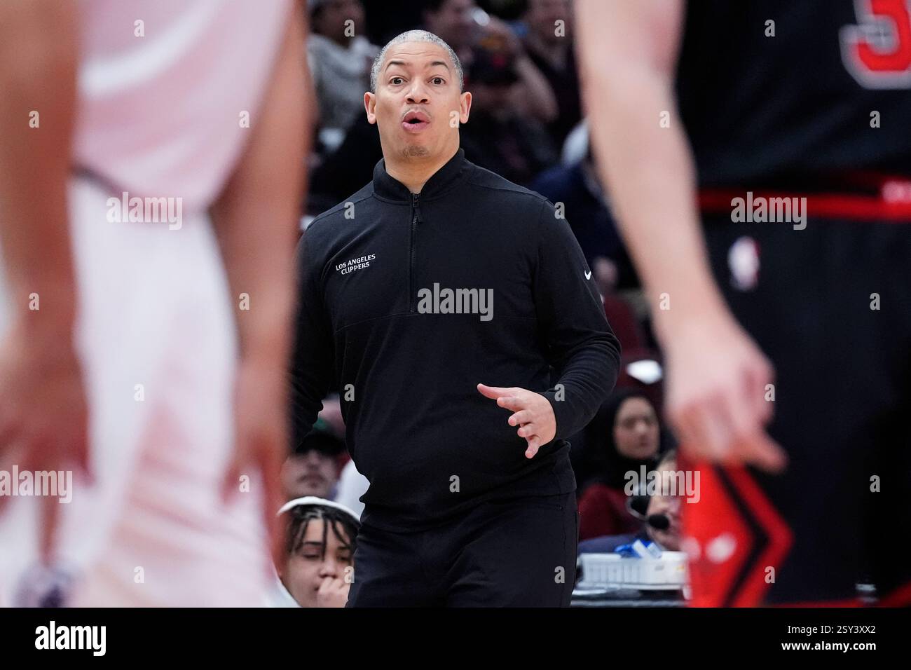 LA Clippers head coach Tyronn Lue reacts as he watches players during ...