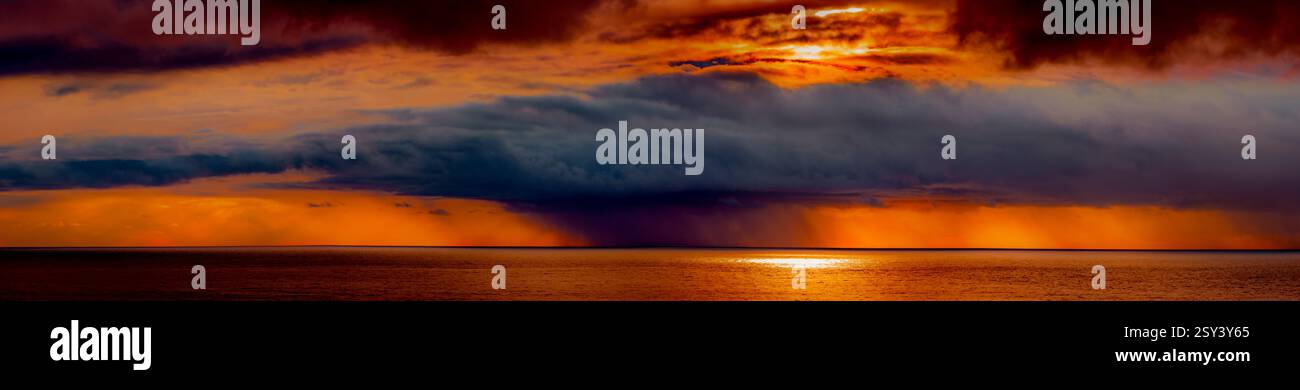 Panoramic Photo of Dramatic sky bursting with orange and contrasted ...