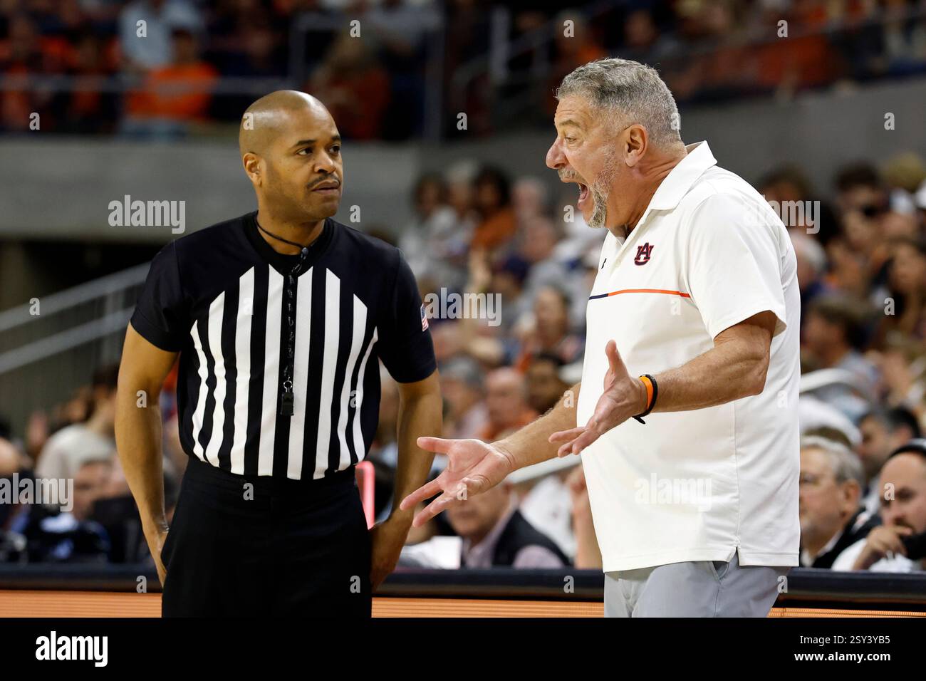 Auburn head coach Bruce Pearl talks with a referee during the second ...