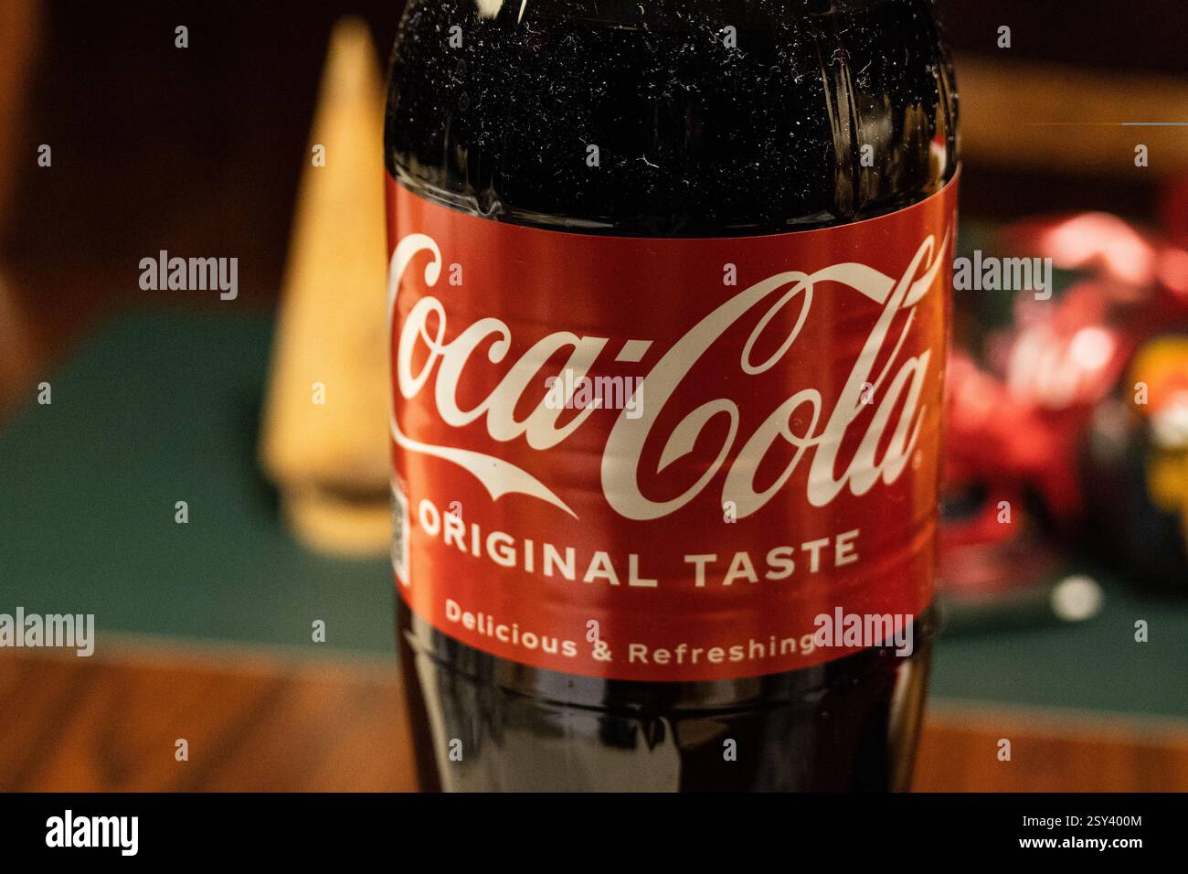 Denmark. 23rd Dec, 2024. In this photo illustration, a Coca-Cola bottle ...