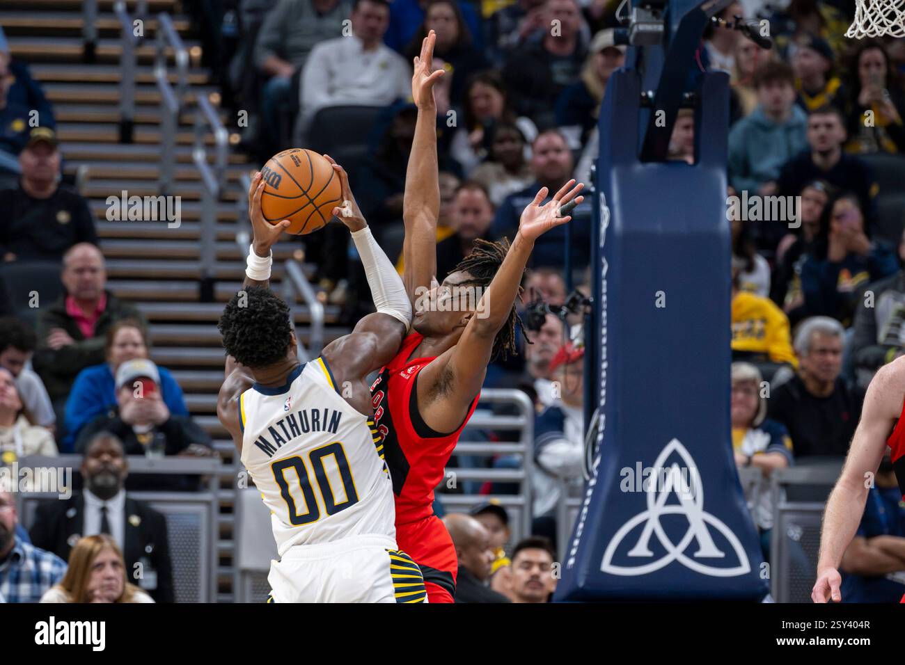 Indiana Pacers guard Bennedict Mathurin (00) shoots while being ...