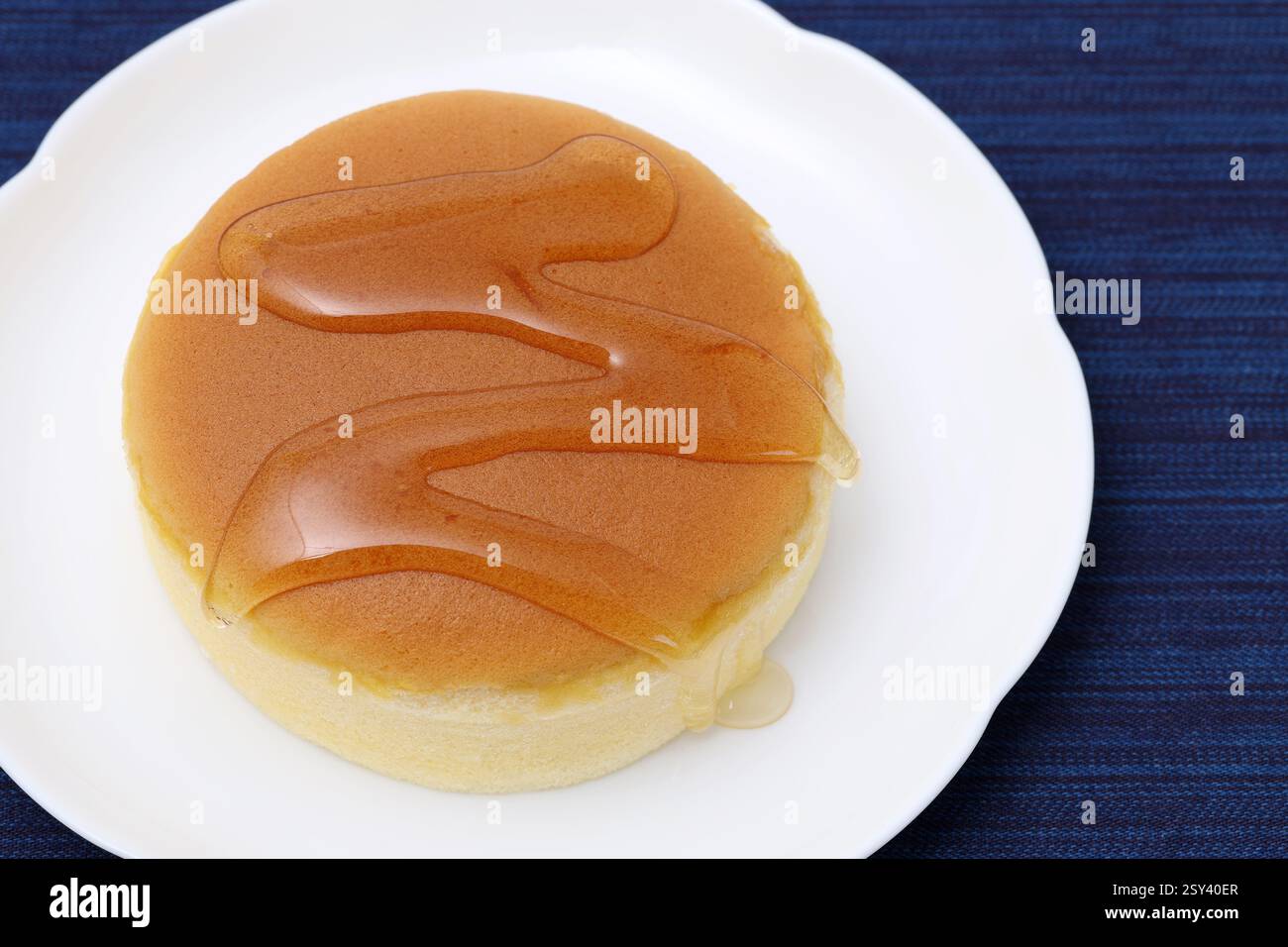 Homemade round castella cake with honey, Sponge cake. Homemade bakery ...