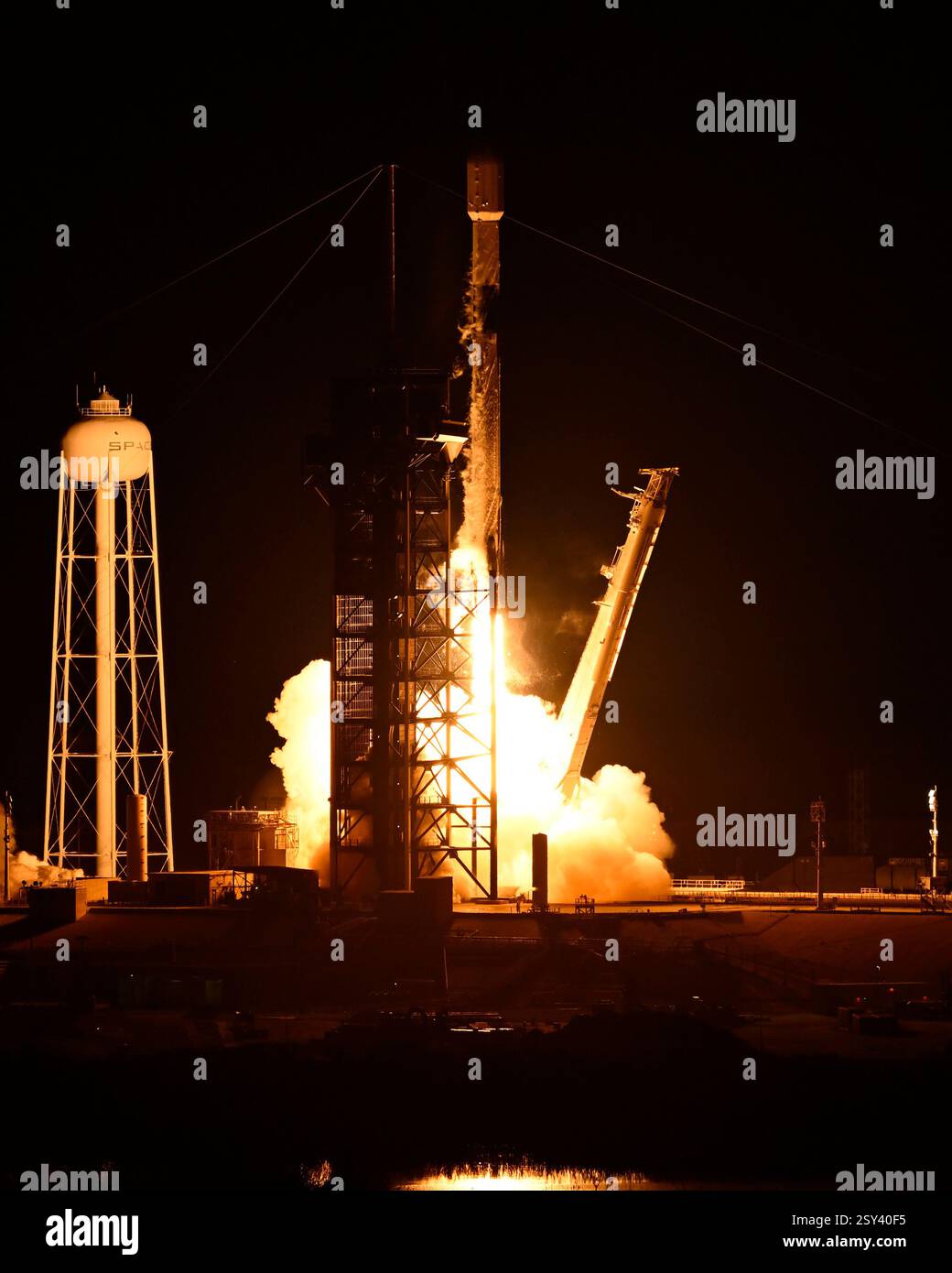 Kennedy Space Center, United States. 26th Feb, 2025. A SpaceX Falcon 9 ...
