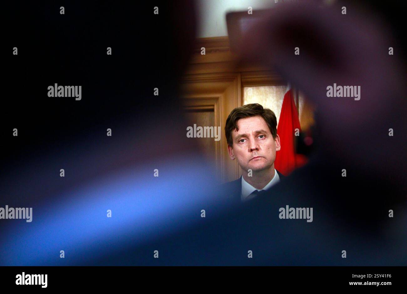 Victoria, Can. 18th Feb, 2025. Premier David Eby speaks to reporters ...