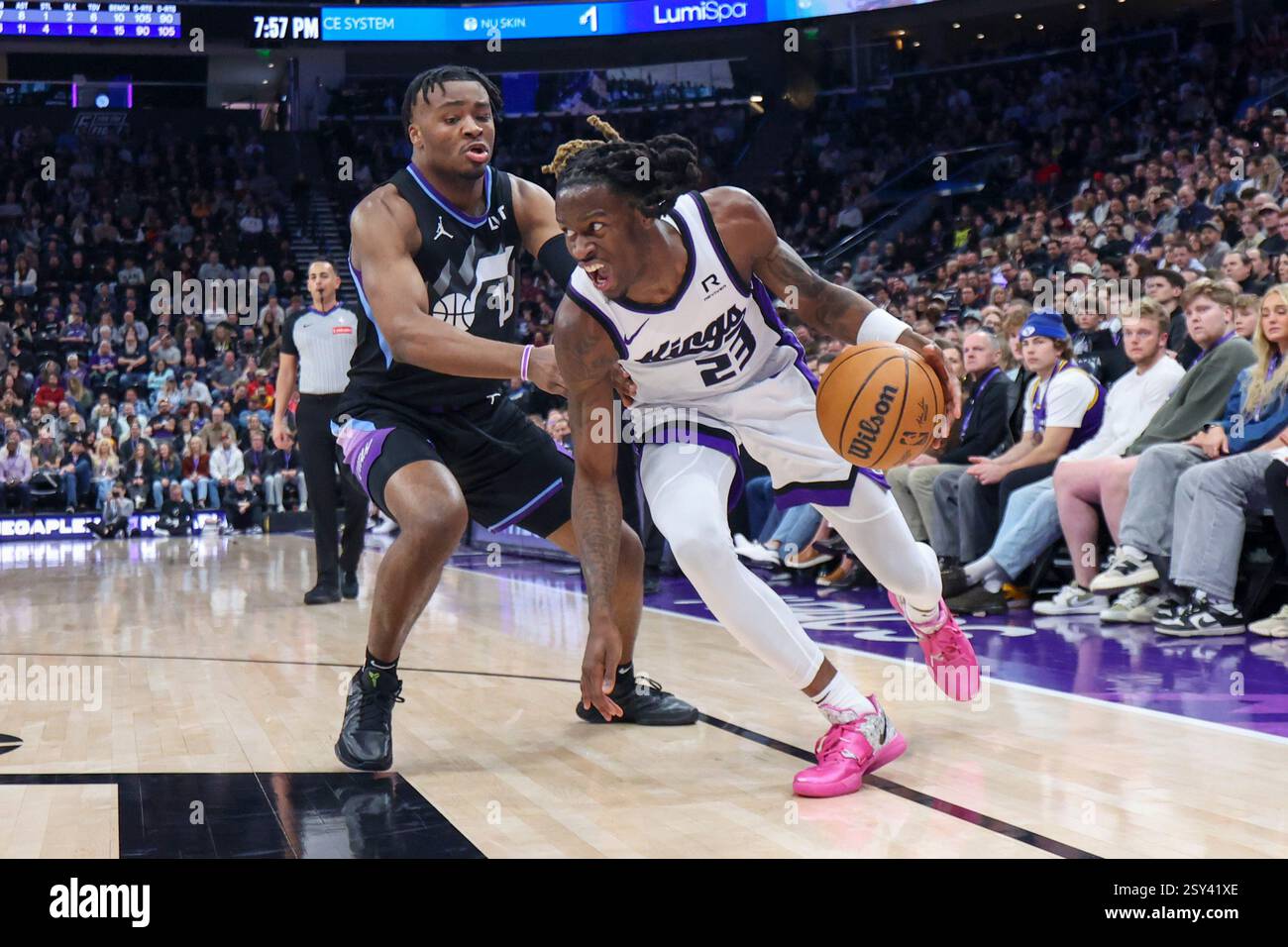 Sacramento Kings guard Keon Ellis (23) drives against Utah Jazz guard ...