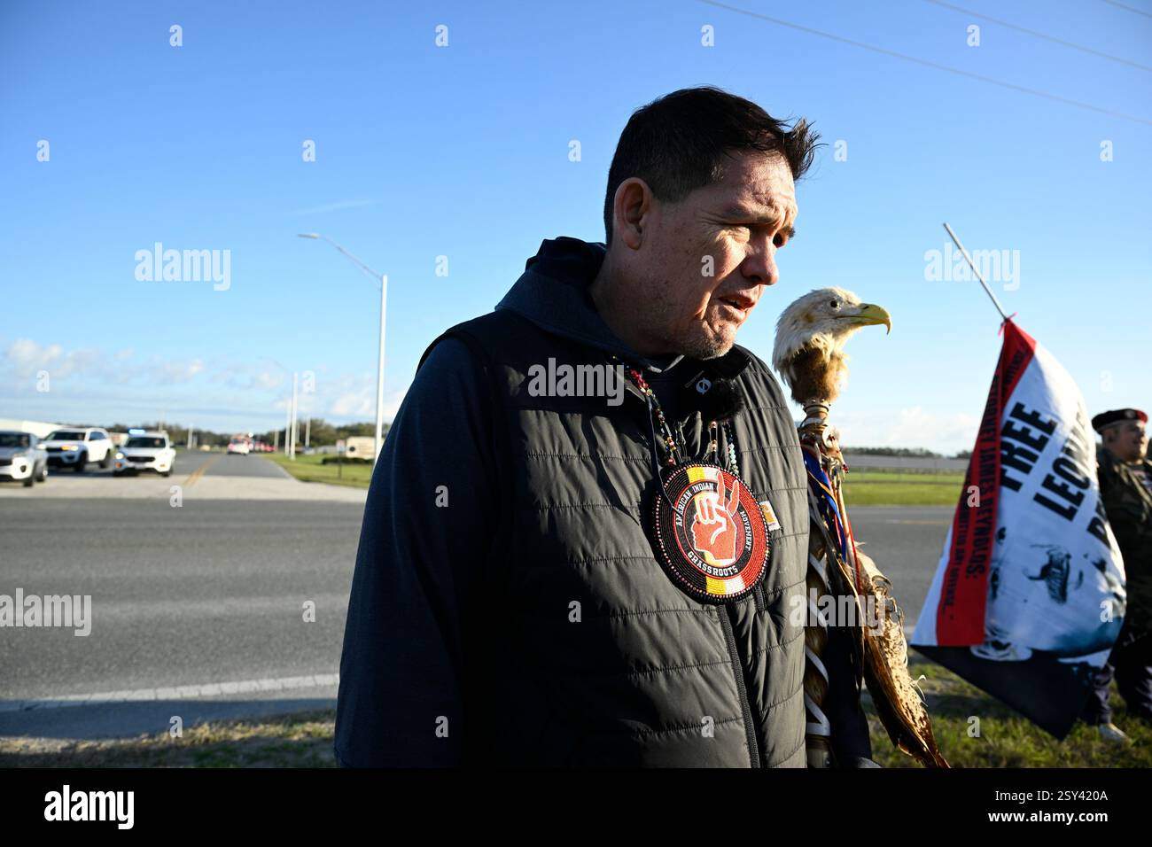 Ray St. Clair, of Minnesota, talks with reporters while standing in ...