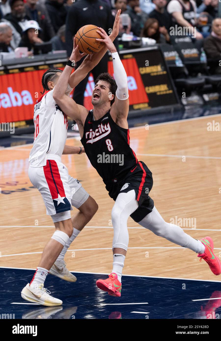 WASHINGTON, DC - FEBRUARY 26: Portland Trail Blazers forward Deni Avdija (8) pushes past ...