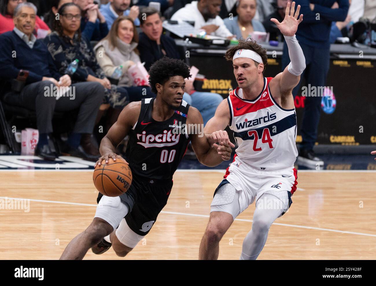 WASHINGTON, DC - FEBRUARY 26: Portland Trail Blazers guard Scoot Henderson (00) drives past ...