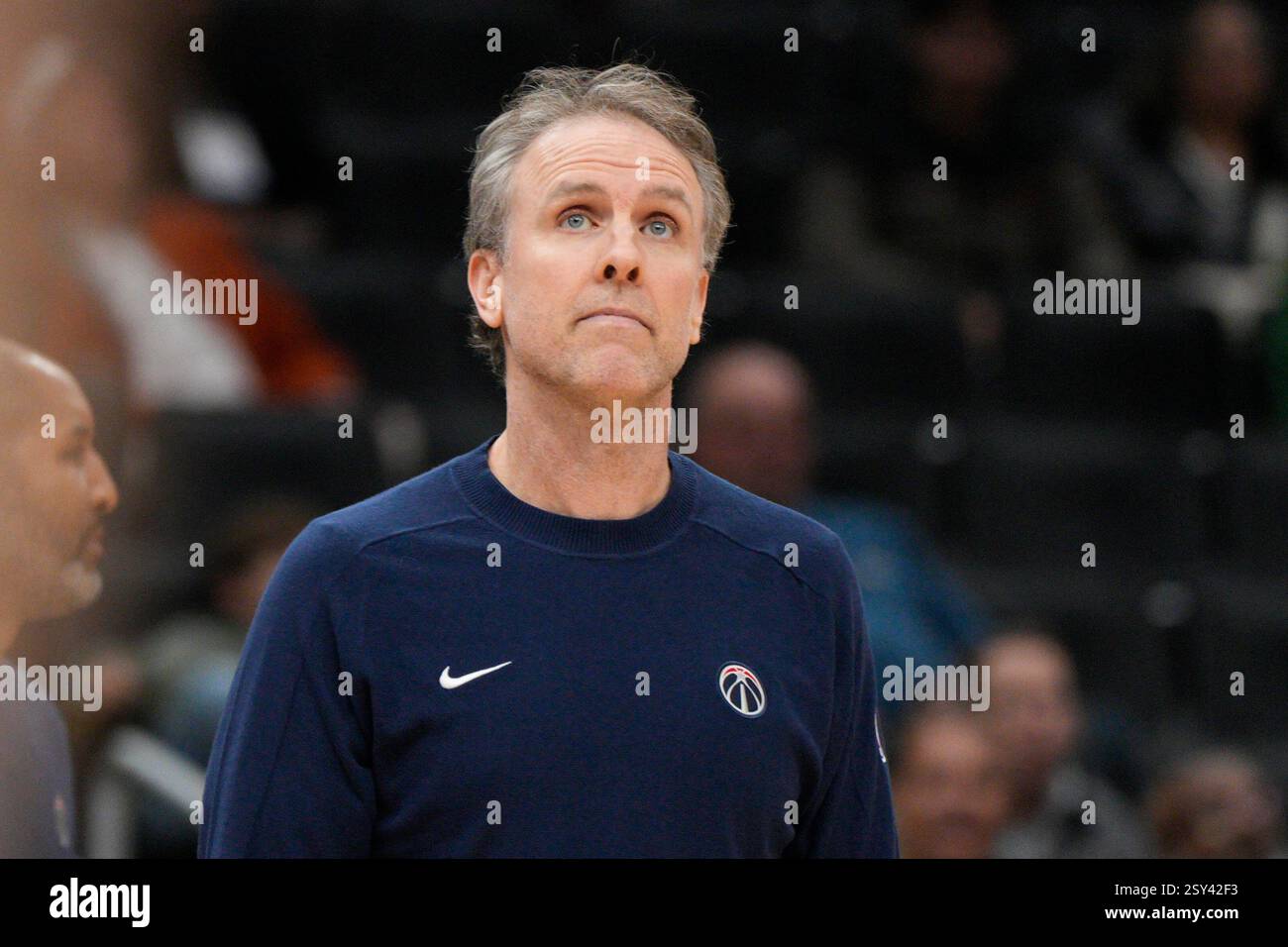 Washington Wizards head coach Brian Keefe looks on during the first ...