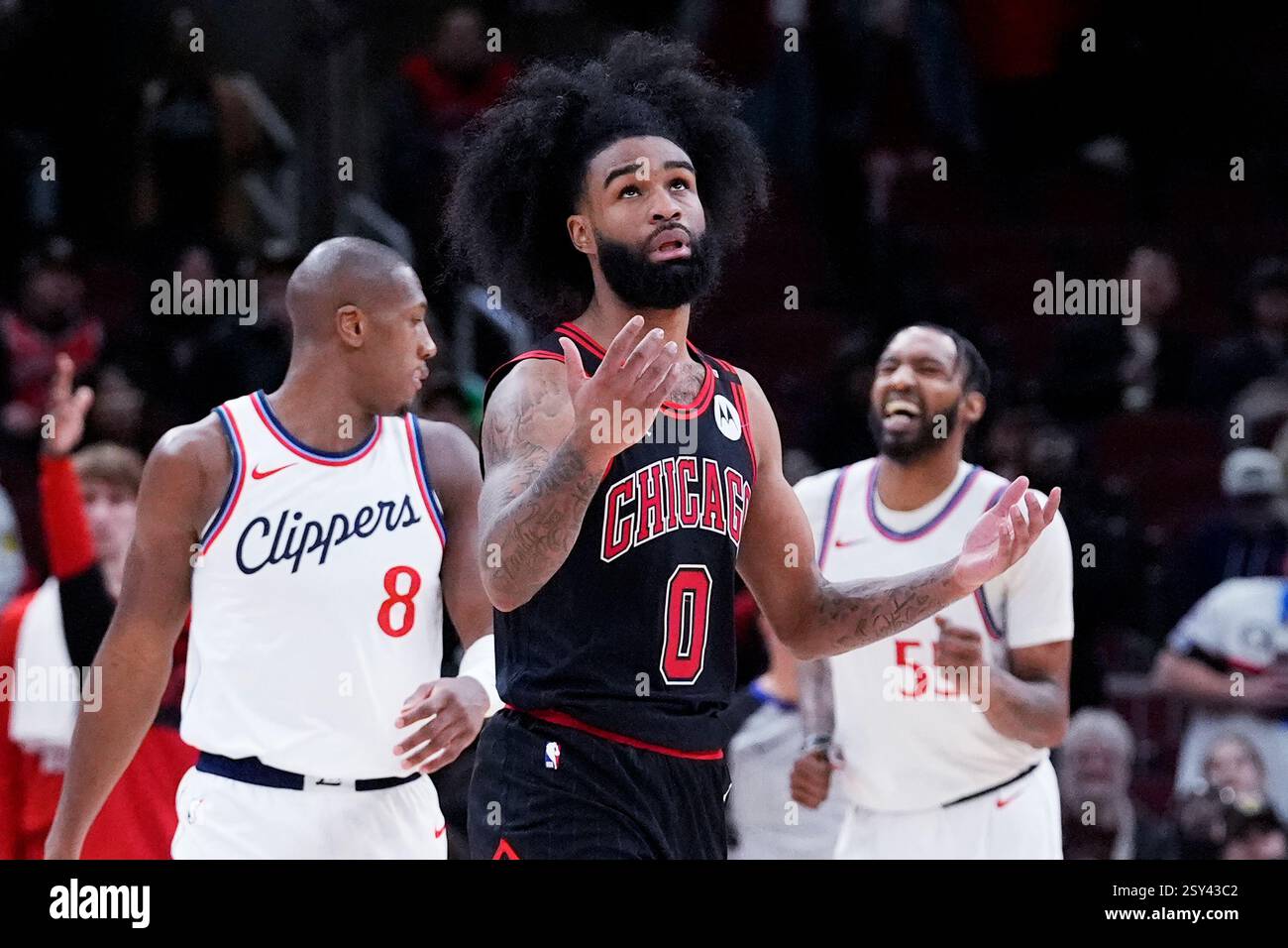 Chicago Bulls guard Coby White (0) reacts after scoring a three-point ...