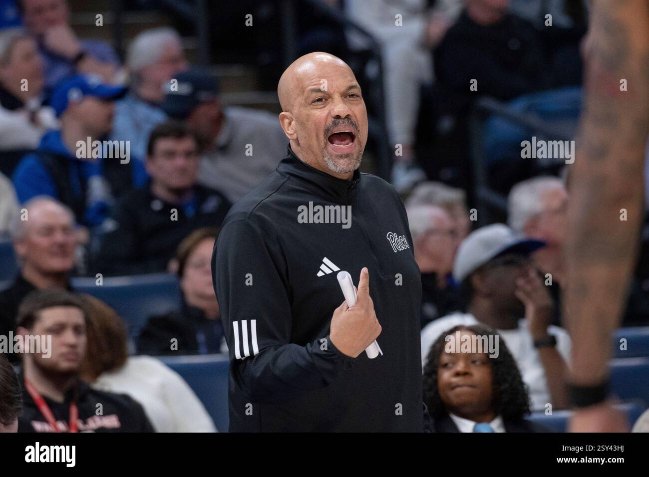 Rice head coach Rob Lanier instructs his team against Memphis during ...