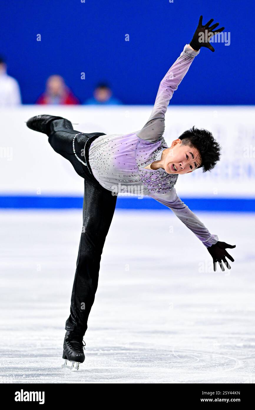 Yanhao LI (NZL), during Junior Men Short Program, at the ISU World ...