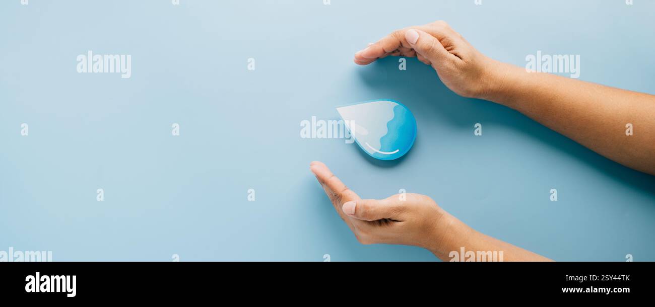 Celebrate World Water Day with hands holding a water drop paper cut ...