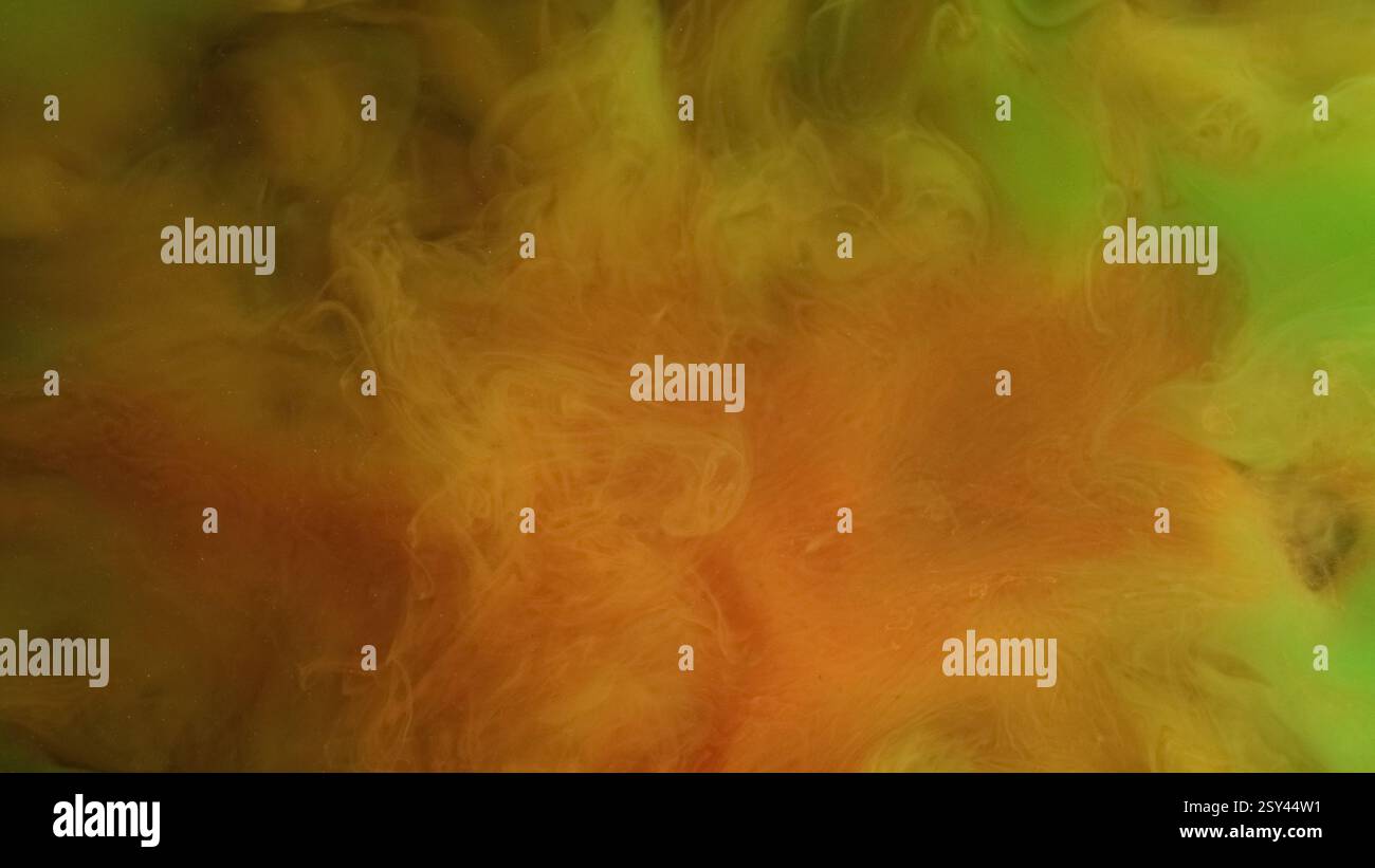 Smoke wave. Color fog. Orange yellow green stream mix in defocused ...