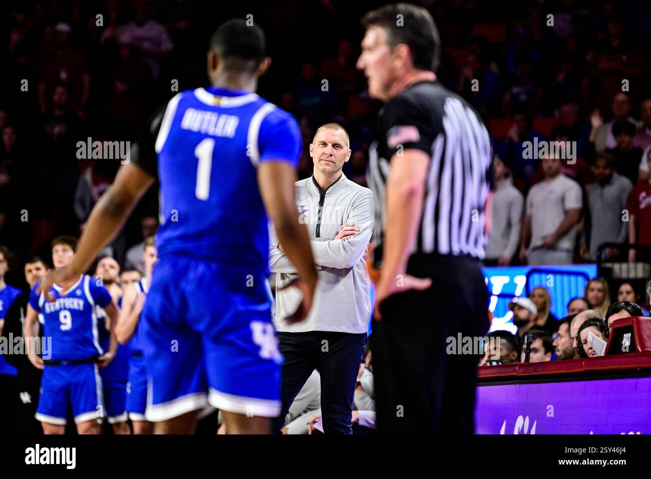 Kentucky head coach Mark Pope watches as Kentucky guard Lamont Butler ...