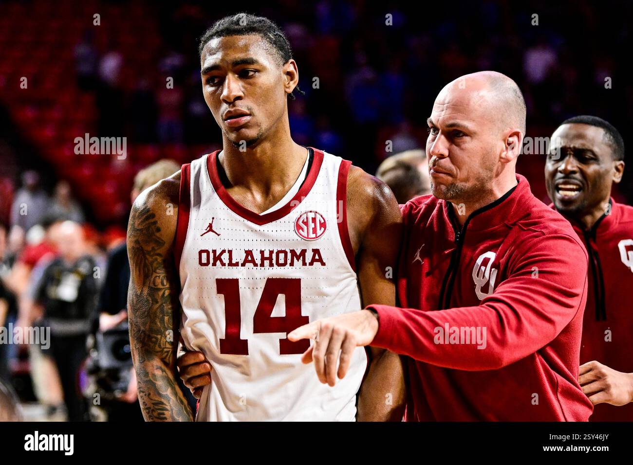 Oklahoma forward Jalon Moore (14) walks off the court after an NCAA college basketball game ...