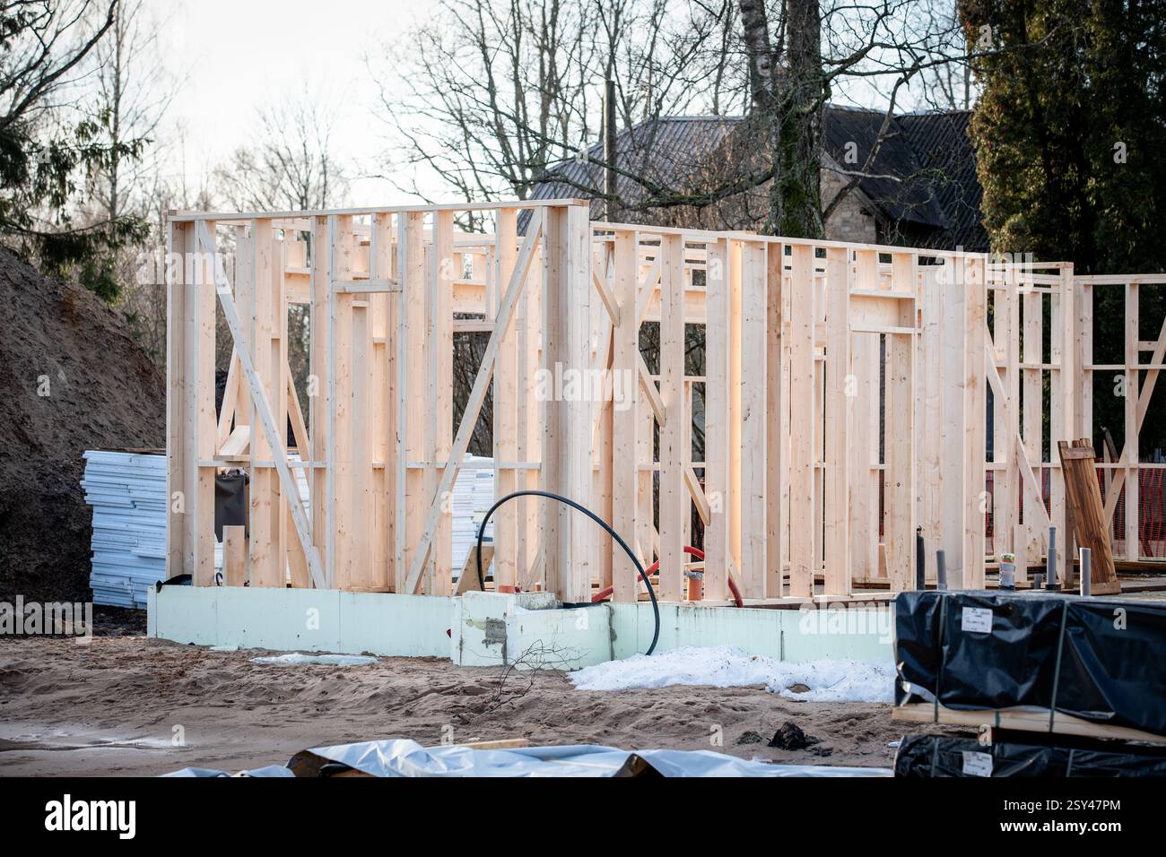 Timber frame building. Building structures on a construction site ...