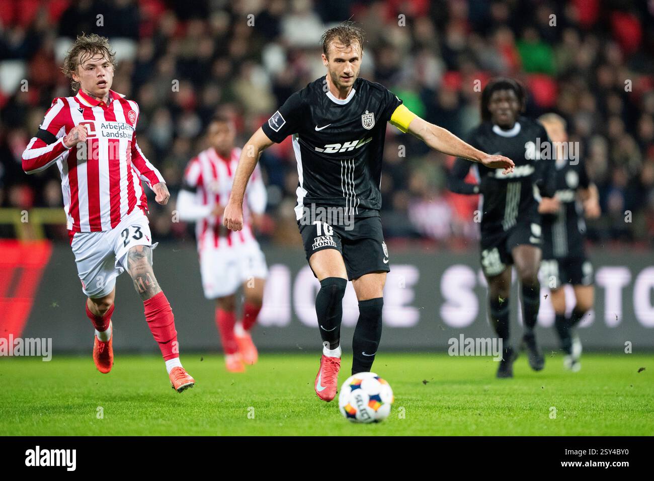 FCN's Benjamin Nygren in a run with AaB's Isak Aaroeen during the ...