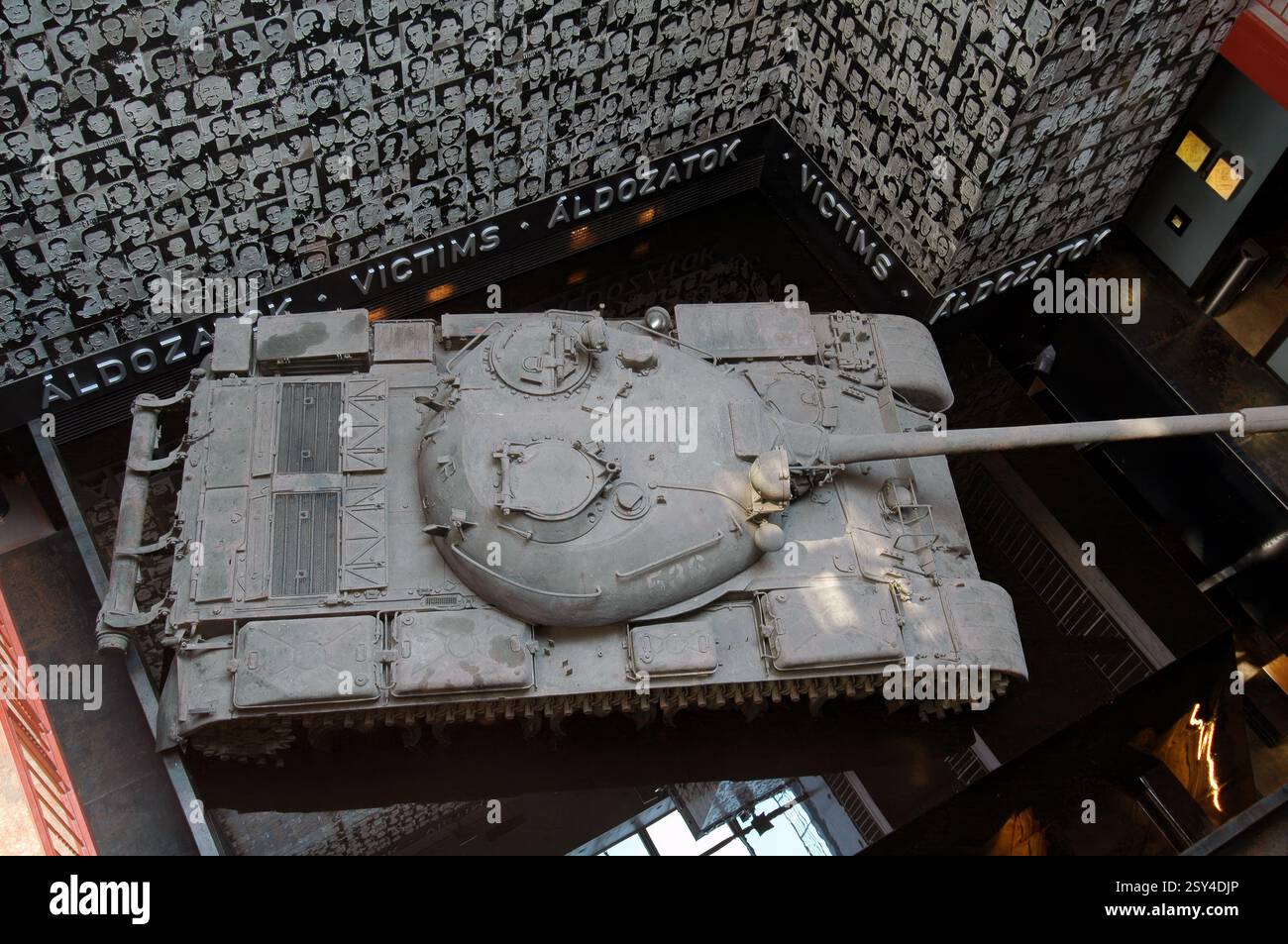 An old T-54 Soviet tank with installation of photos featuring victims ...