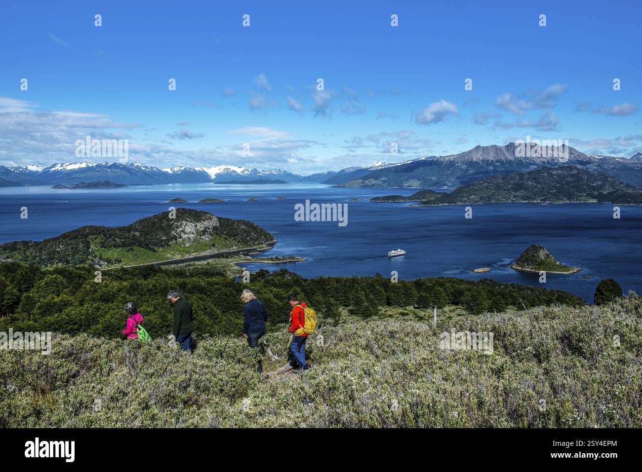 Hikers and cruise ship Ventus Australis in Wulaia Bay, Beagle Street ...