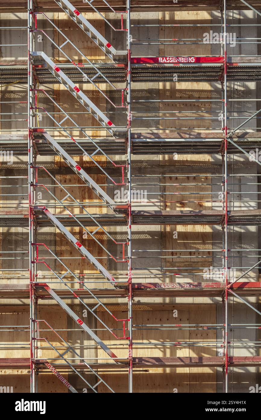 Construction site with scaffolding, shell of a residential building ...