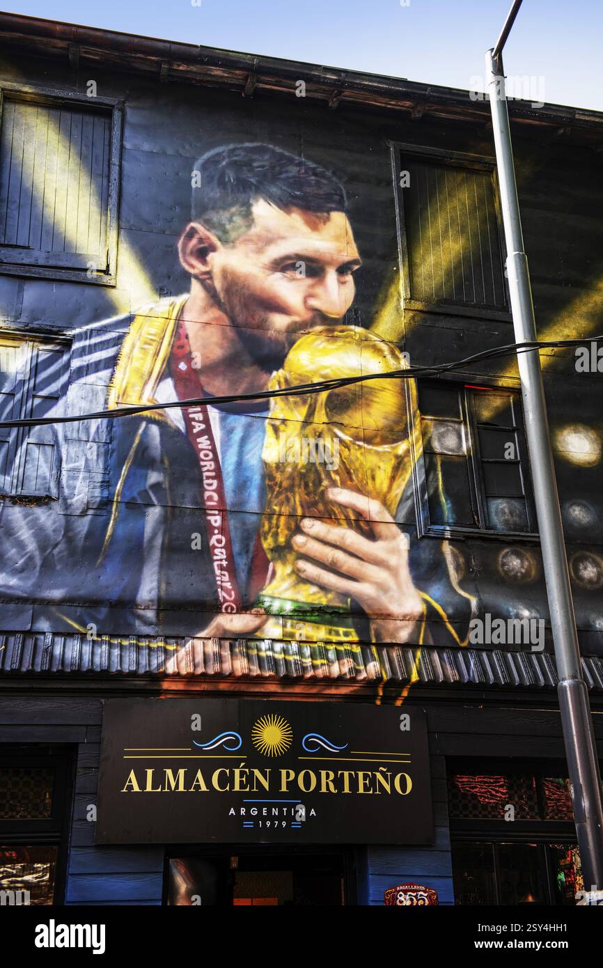 Lionel Messi with World Cup trophy on the wall of a house at El ...