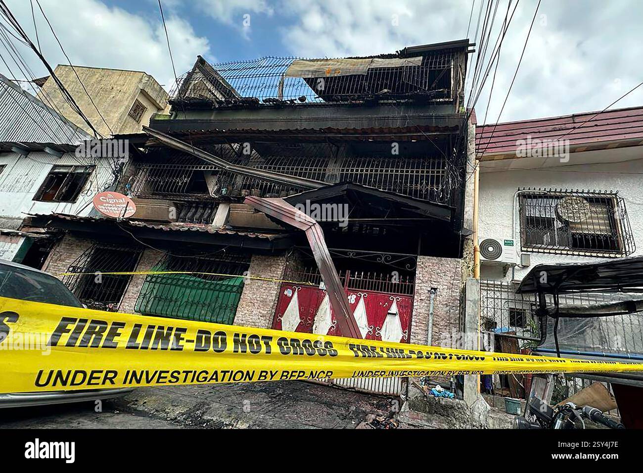 A building damaged by a fire stands in San Isidro Galas village in ...