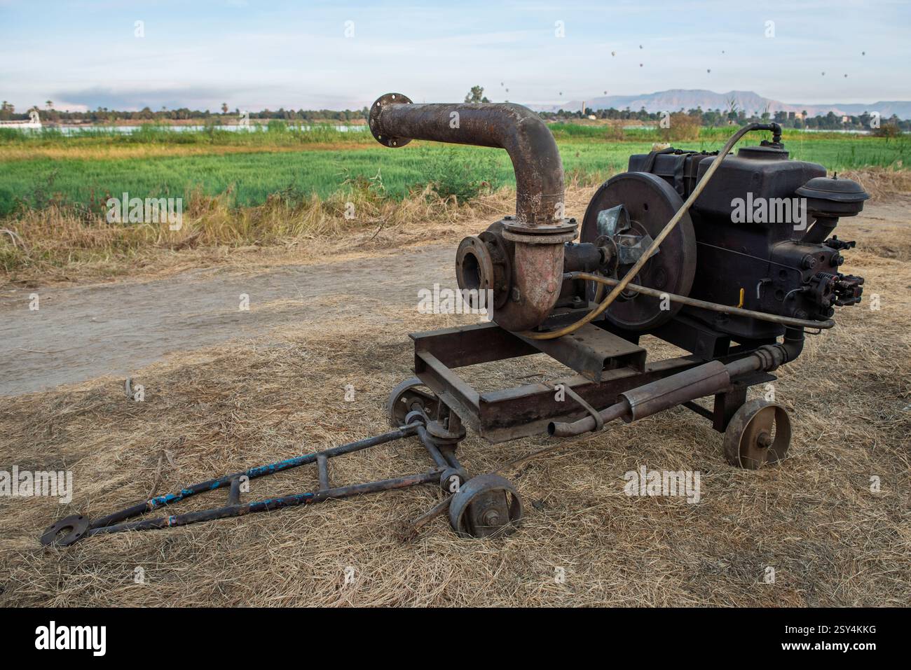 Old diesel water pump for irrigation by arable agricultural field ...