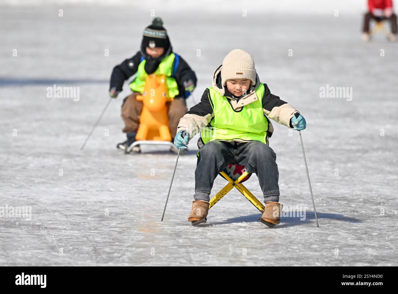 **CHINESE MAINLAND, HONG KONG, MACAU AND TAIWAN OUT** Tourists play at ...