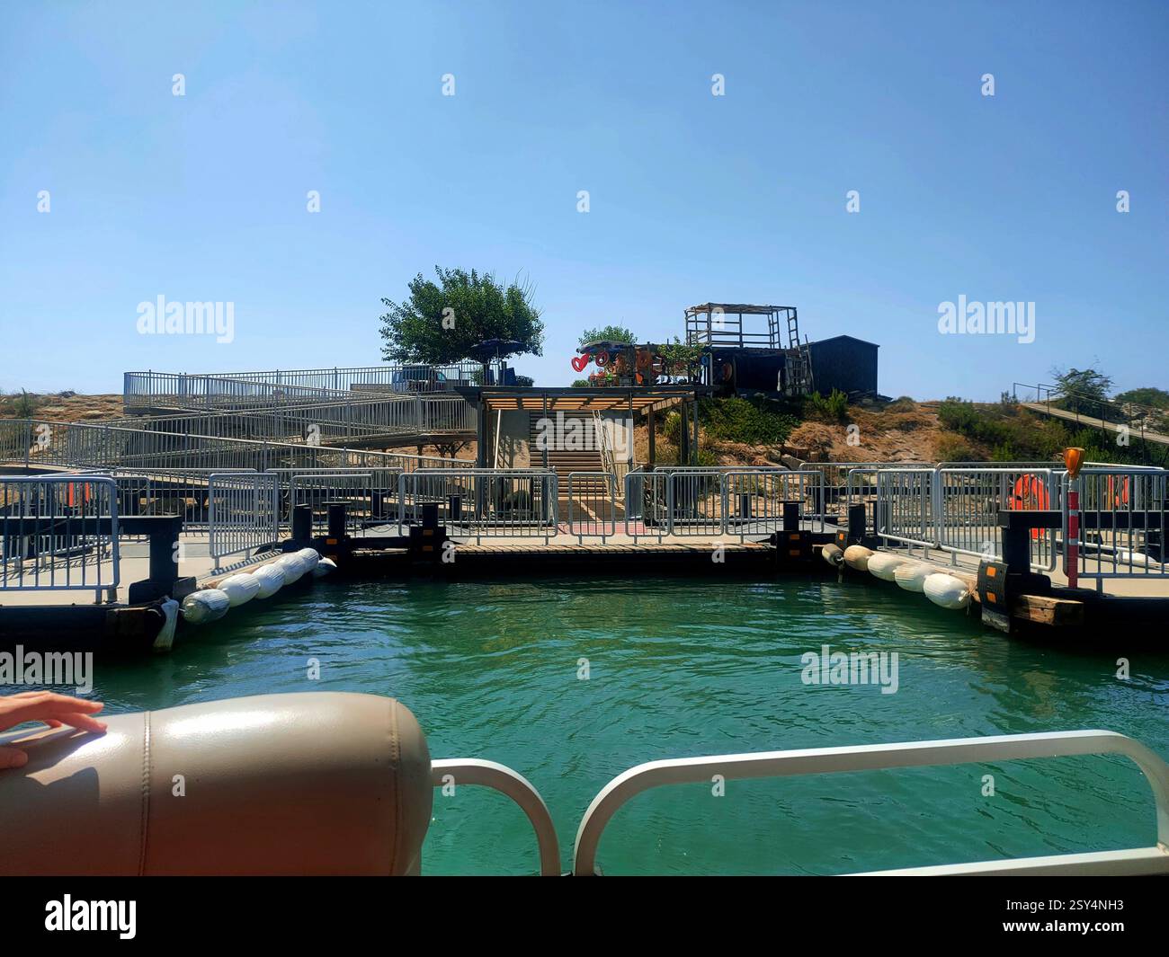 View of the small wooden port from a boat Stock Photo - Alamy