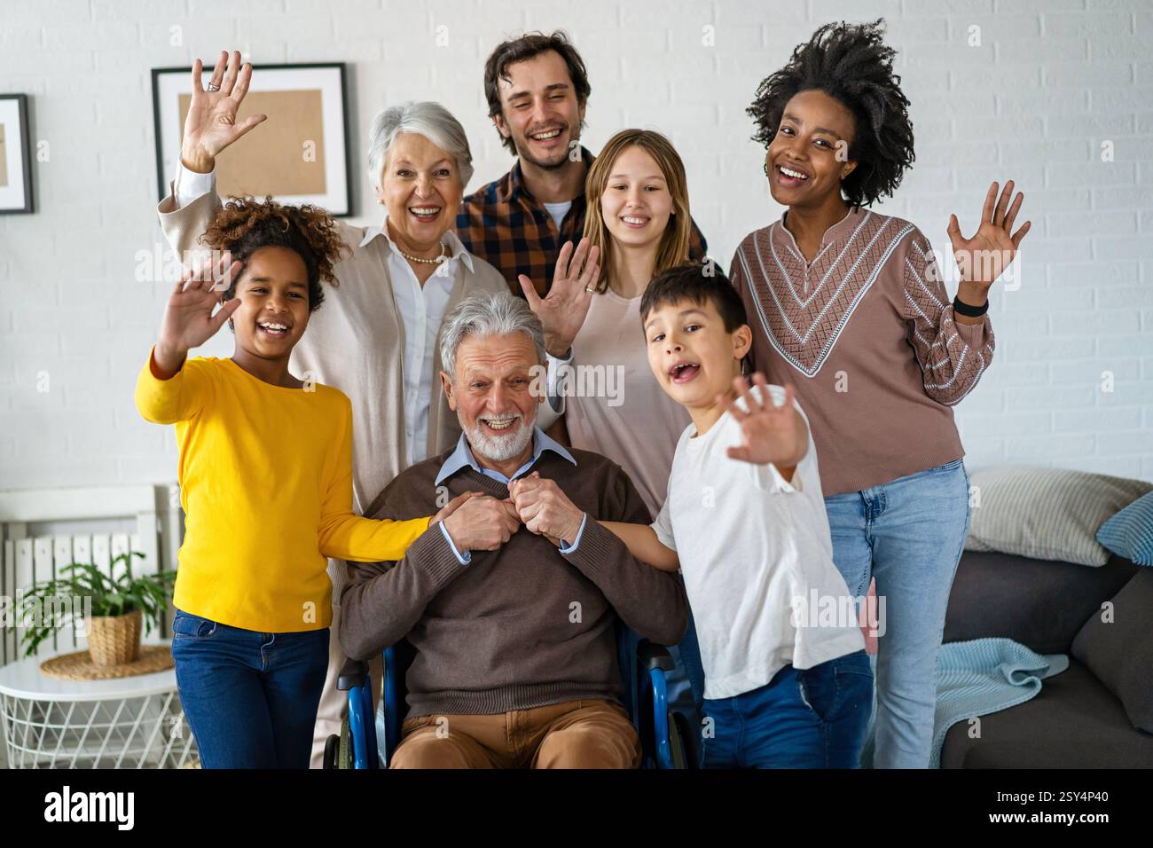 Extended multiethnic diverse family with children,grandparents and parents having fun together ...