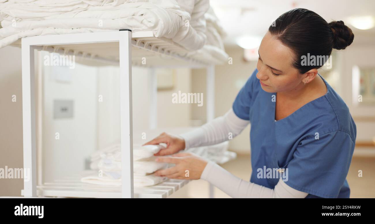 Nurse, inventory and woman in hospital for check stock, towels and ...