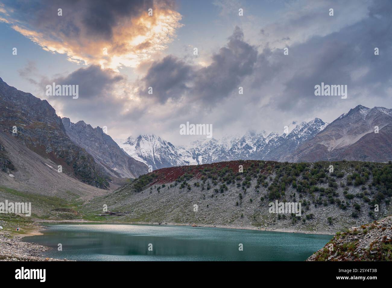 Colorful landscape view of Rama lake with Chongra peak in background at ...