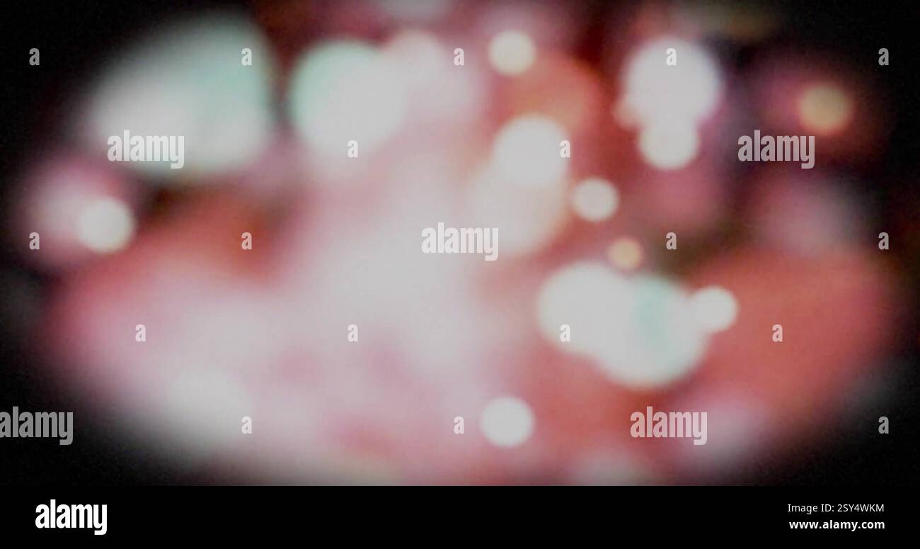 Image of colourful moving spots on black background Stock Photo - Alamy