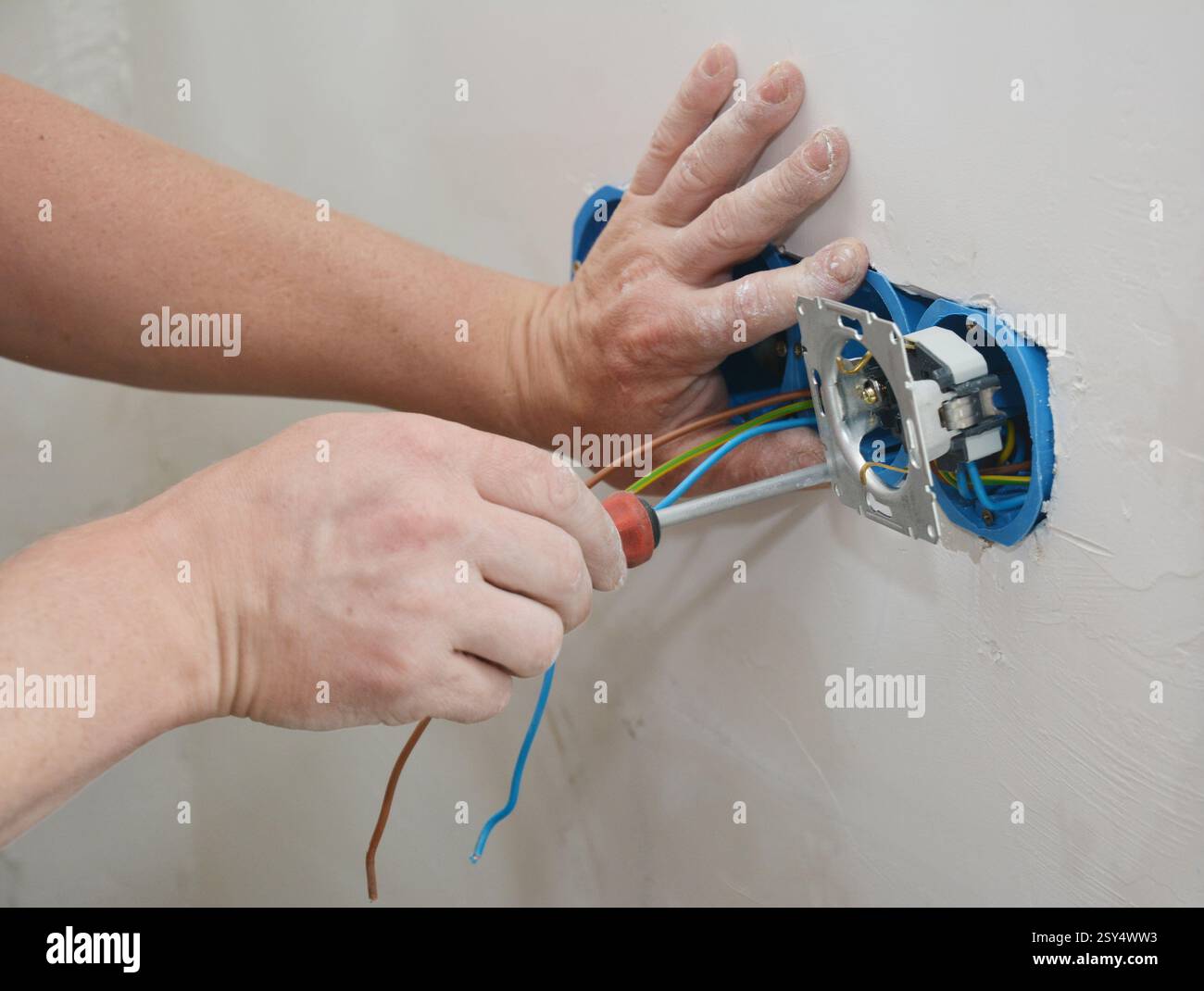 Socket plug installation. Electrican repair and installing socket ...