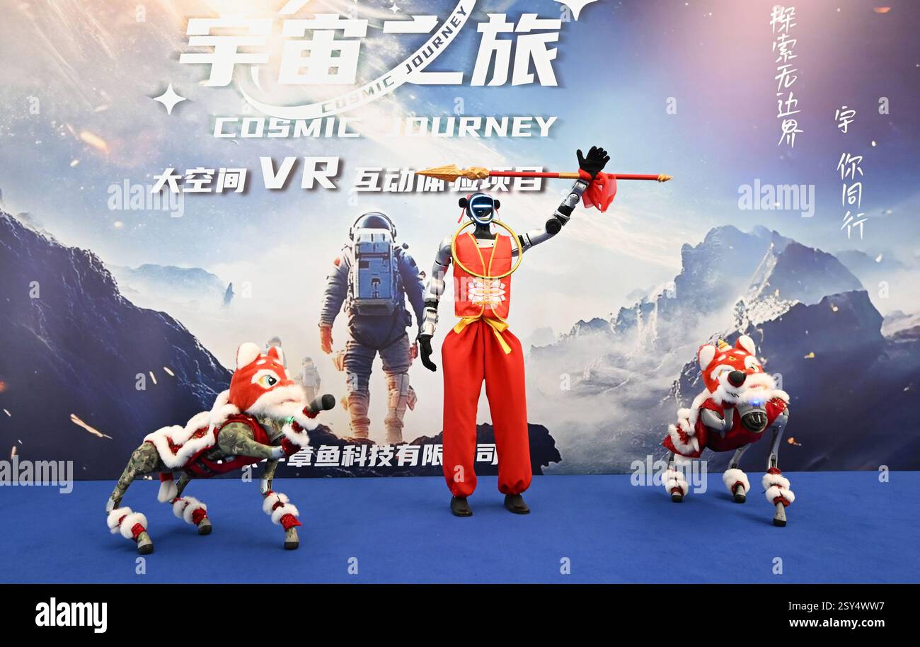 Hangzhou,China.26th February 2025. Robot dogs dressed as lion dancers ...