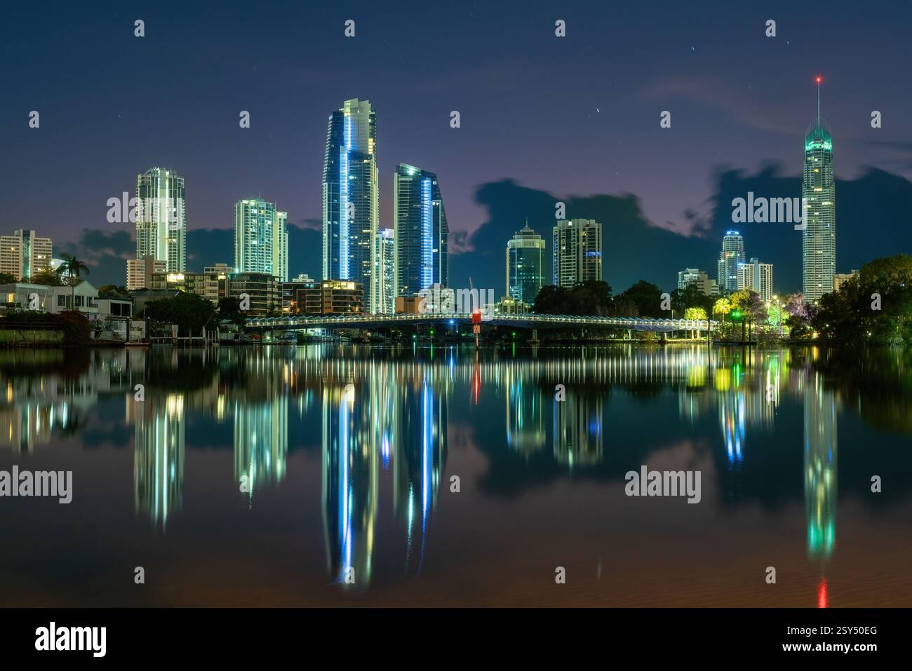 A calm morning looking down the Nerang River at the high rises of the ...