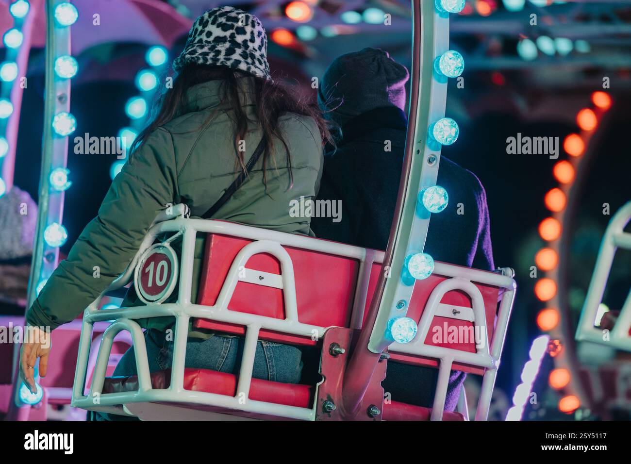 Romantic couple ride on swing hi-res stock photography and images - Alamy
