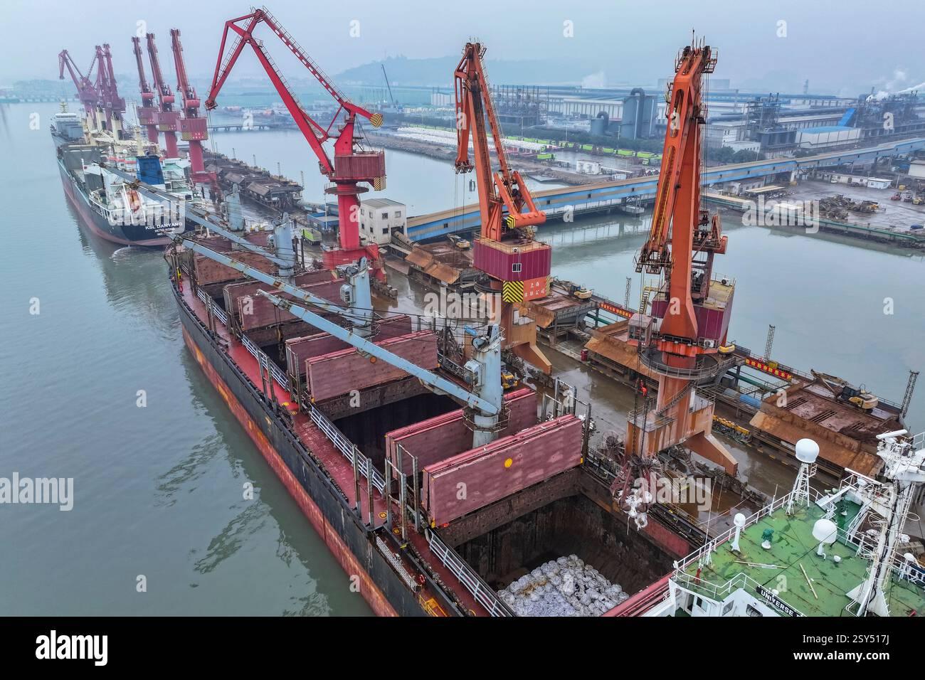 FUAN, CHINA - FEBRUARY 27, 2025 - A ship carrying 20,000 tons of nickel ore carries out loading ...