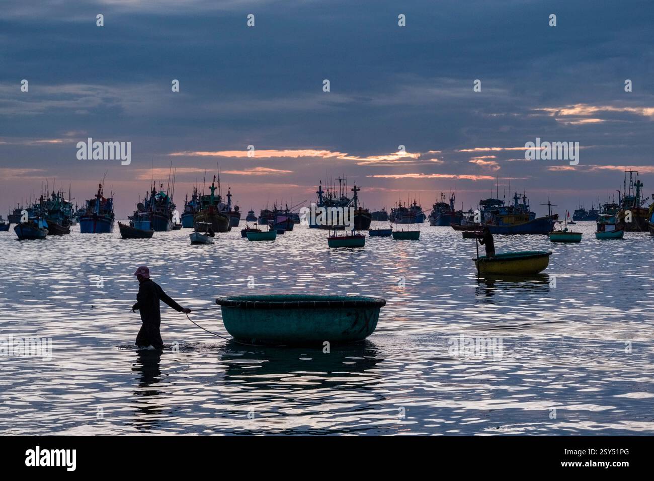 A man pulls a fishing ne hi-res stock photography and images - Alamy