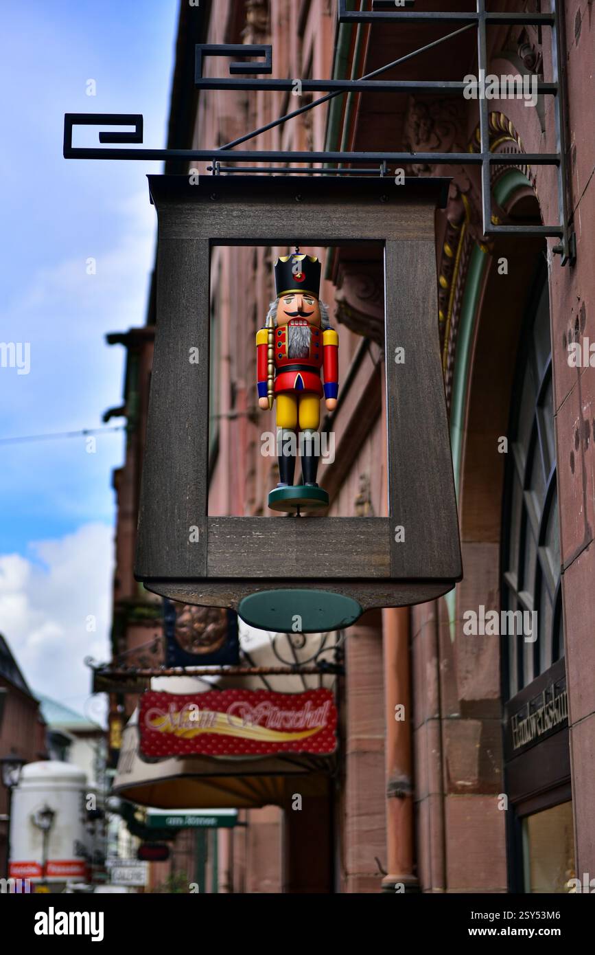 Hanging shop sign with a wooden toy soldier in Frankfurt, Germany Stock ...